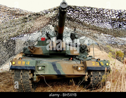 A Republic of Korea Type 88 K1 Main Battle Tank drives off the Korean ...