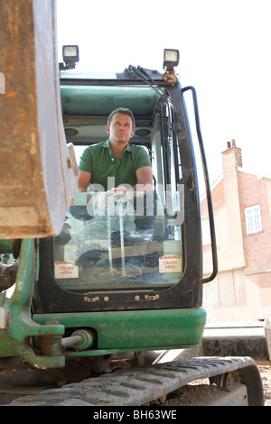 construction worker using digger Stock Photo - Alamy