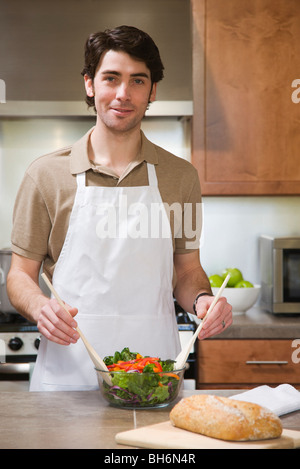 Young man posing and cutting up in studio environment Stock Photo - Alamy