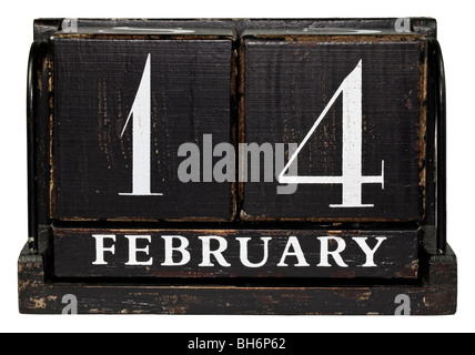 Cube calendar with date 14 FEBRUARY and red rose flowers on light ...