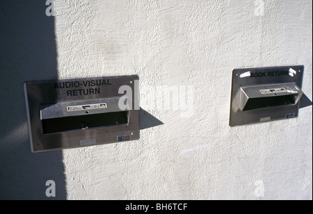 Library outside audio-visual and book return slots Stock Photo - Alamy