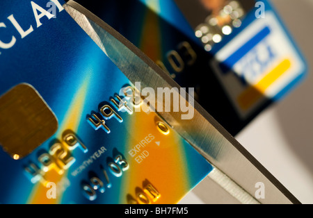 credit cards being cut Stock Photo - Alamy