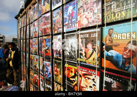 Ecuador; Saquisili; view of DVDs displayed at a market stall with ...