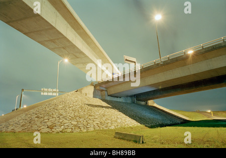 Bottom view of elevated concrete highway. Overpass concrete road. Road ...