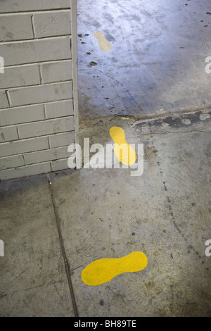Footprints in concrete Stock Photo - Alamy