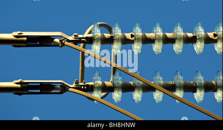 Overhead power lines with glass insulators, East Sussex, UK Stock Photo ...