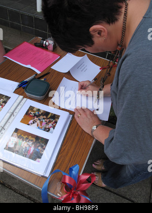 Signing the Register Stock Photo - Alamy