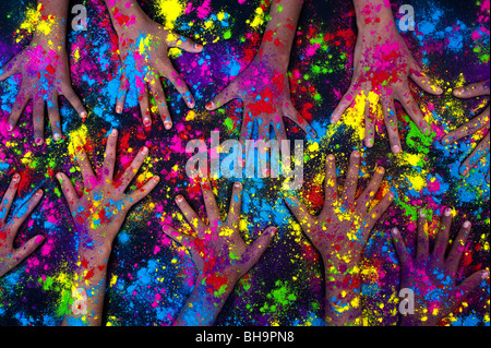 Multicoloured powder hands on black panoramic. India Stock Photo - Alamy