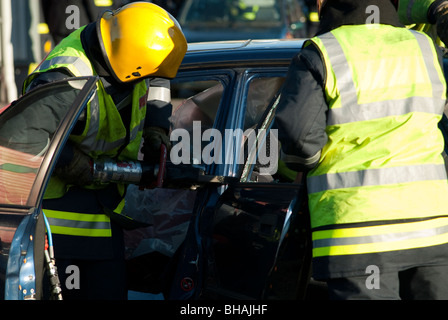 Firemen practicing RTC extrication procedures Stock Photo - Alamy