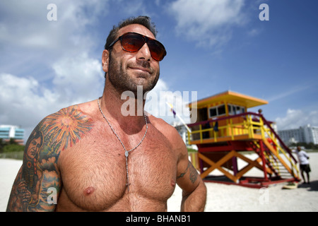 USA, Florida, Miami Beach, Mature woman sitting on beach Stock Photo ...
