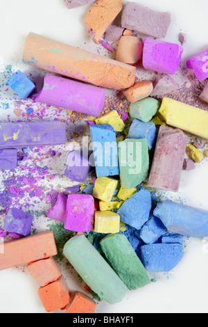 Colorful chalk broken colors mess over white Stock Photo - Alamy