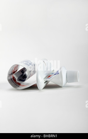 Toothpaste with a squeezer dispenser empty tube cut out cutout isolated ...