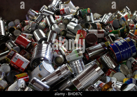 Waste processing, waste sorting. Recycled tin can waste compressed into ...