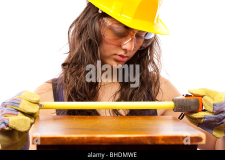 Beautiful latino construction worker woman isolated on white background ...