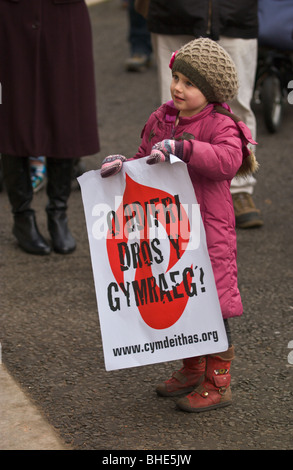 Young girll holding Welsh Language Society, Cymdeithas yr iaith Gymraeg ...
