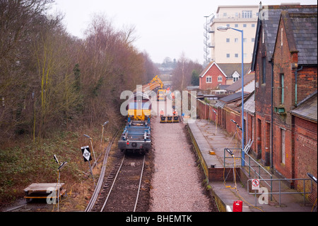 Workmen renewing the railway track near the station in Beccles ...