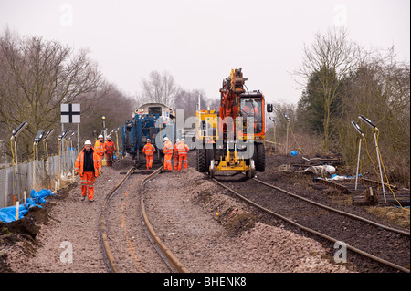 Workmen renewing the railway track near the station in Beccles ...