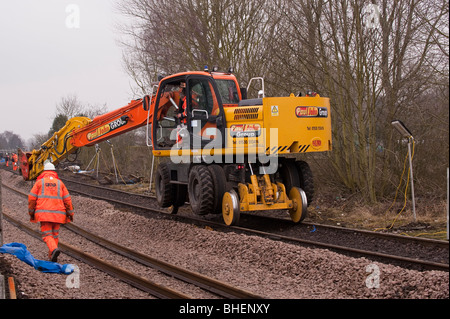 A special machine for renewing the railway track near the station in ...