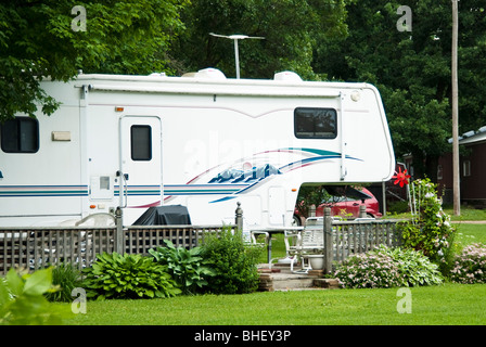 RV trailers parked in campground Stock Photo - Alamy