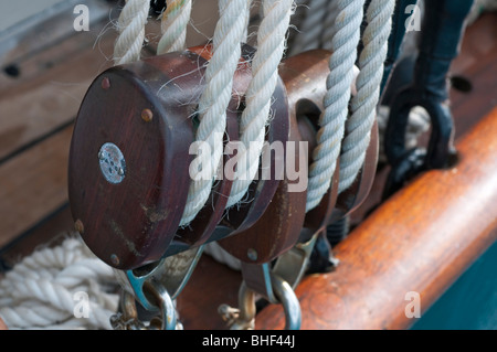 Tall Ship Rigging. Block and Tackle pulleys with ropes next to the mast ...