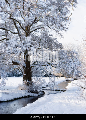 Winter snow scene of the picturesque village of Castle Combe, Cotswolds ...