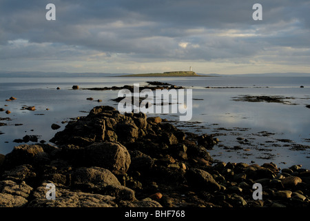 Pladda Lighthouse at dusk from Kildonan Shore on the Island of Arran ...