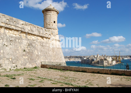 Malta's defense wall and watch tower look out towards the Mediterranean ...