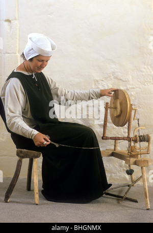 Medieval spinning wheel Stock Photo - Alamy