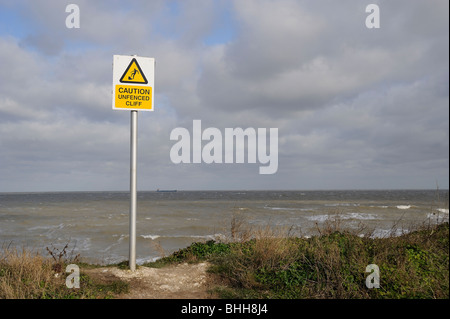 Caution Unfenced Cliff Sign joss bay Kent England Stock Photo - Alamy