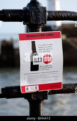 Anti social drinking sign on lampost at British seaside resort. UK ...