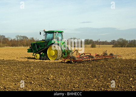 Farming in Lincolnshire - John Deer track tractor pulling soil ...