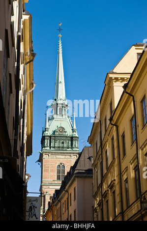 German church and colourful buildings of Gamla Stan in Stockholm viewed ...