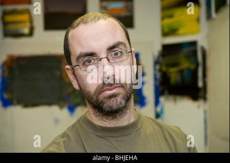 Welsh artist Elfyn Lewis in his studio at Cardiff Bay South Wales UK ...