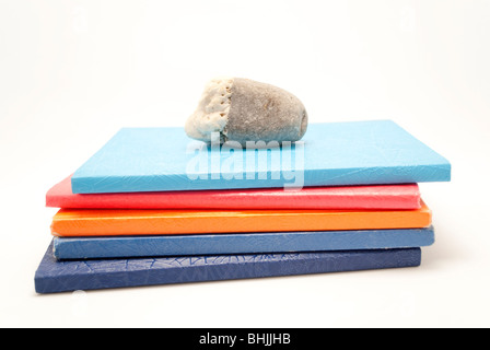 Blank notebooks on orange background Stock Photo - Alamy