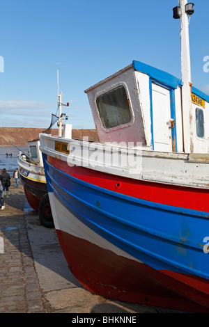 Fishing boat boats on The Coble Landing in summer Filey North Yorkshire ...