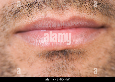 Close up of man's mouth with lips stitched or sewn shut Stock Photo - Alamy