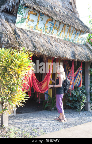 A woman tourist shopping for costa rican crafts in a craft shop, La ...