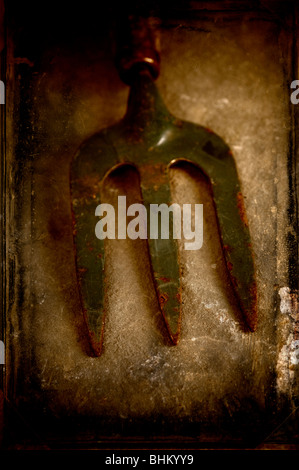 Rusty Old Fork Gardening Tool on Concrete Floor Background Stock Photo ...