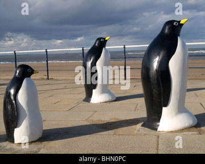 Ornamental statues of penguins on seaside promenade at Redcar Cleveland ...