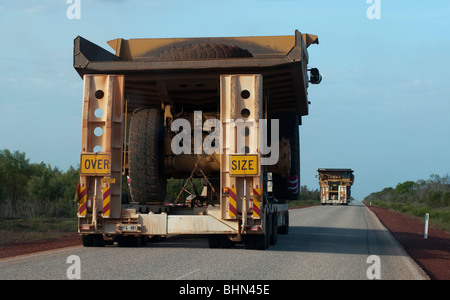Heavy mining equipment being delivered to mine site on outback highway ...