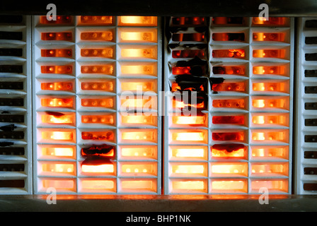 Gas fireplace with a heavy build-up of soot Stock Photo - Alamy