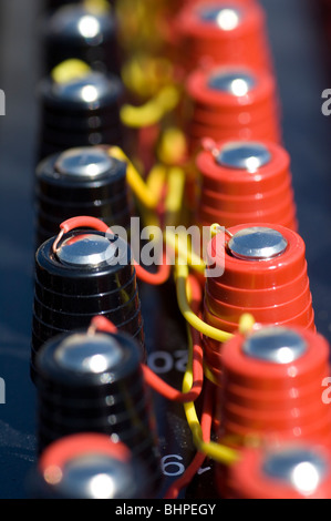 Red and black fuses connected with wires ( professional fireworks ...
