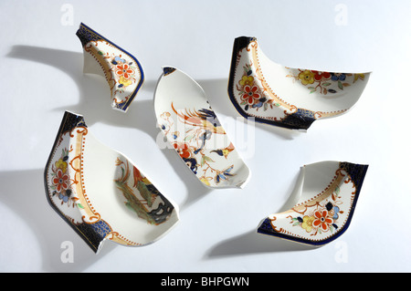 Broken china dishes Stock Photo - Alamy