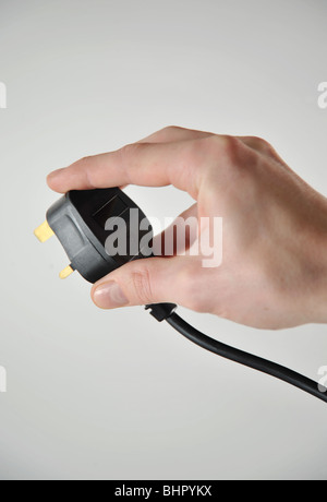 UK style three pin plug showing colours for earth live and neutral plus ...