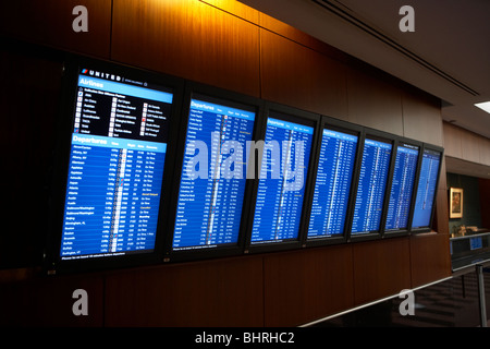 Flight schedule information screens in the International Terminal at ...