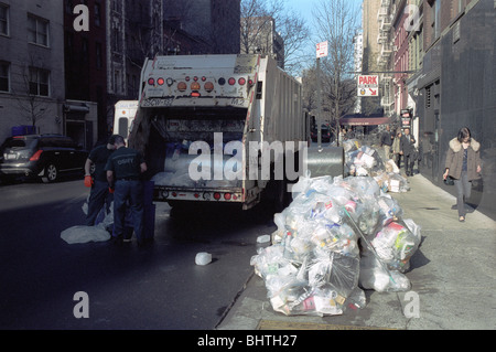 New York City sanitation worker cleaning up after a parade Stock Photo ...