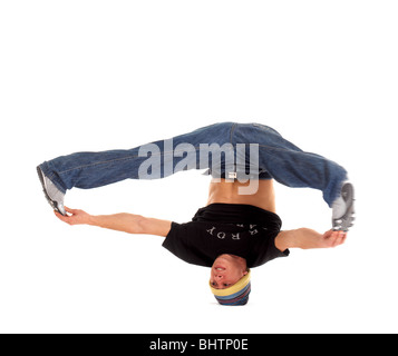 Solo performance. Young man, break dancing dancer ptacticing in casual ...