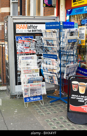 Newspaper rack display outside newsagents shop, Hounslow, London ...