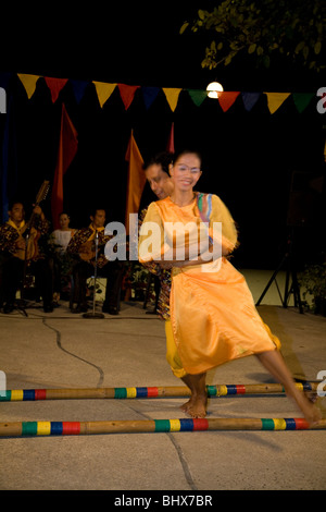 Filipino dancers doing traditional folk dance called "tinikling Stock ...