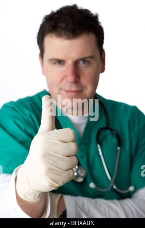 Happy male doctor with thumbs up isolated on white background Stock ...